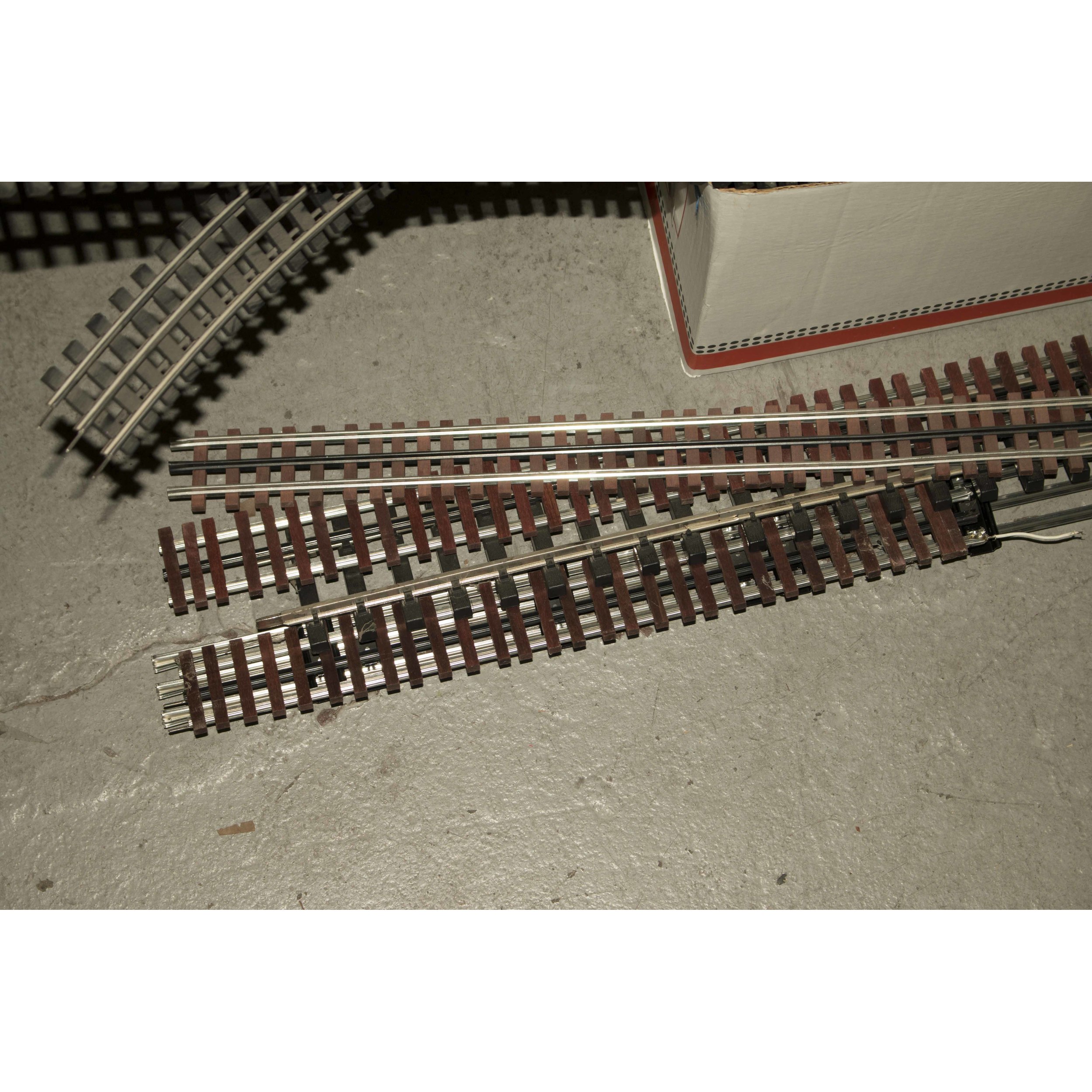 Two Boxes of Train Tracks | Witherell's Auction House