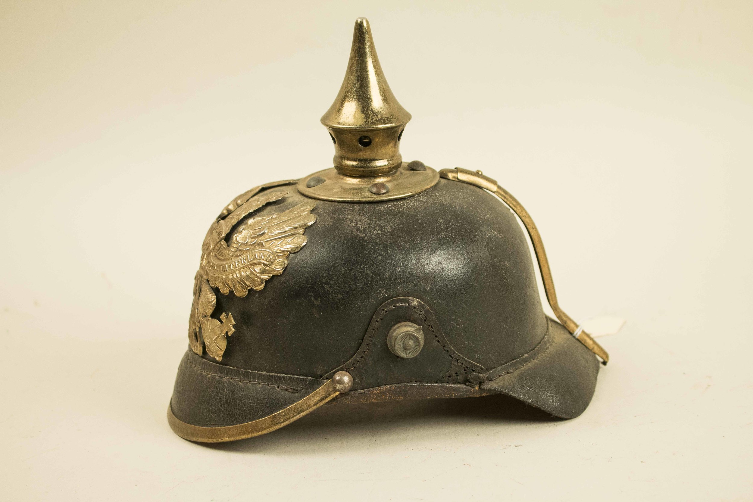 Imperial German Prussian brass mounted spiked helmet | Witherell's ...