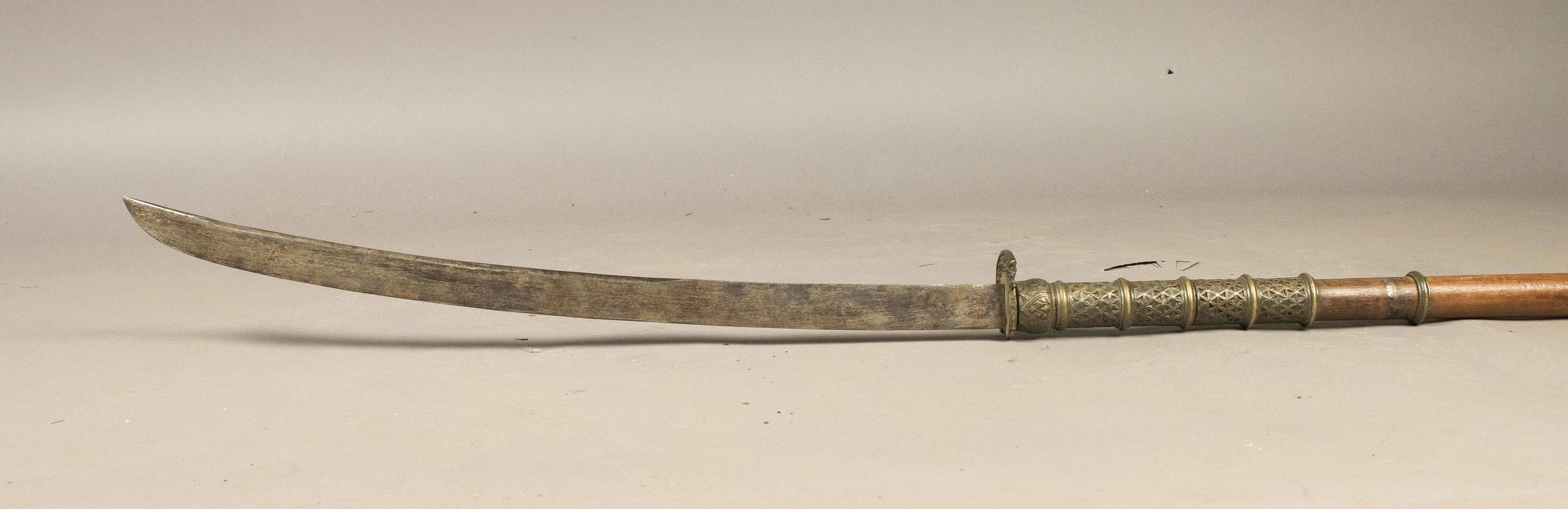 A Chinese Pole Arm, Guandao, with extensive decoration on the haft ...