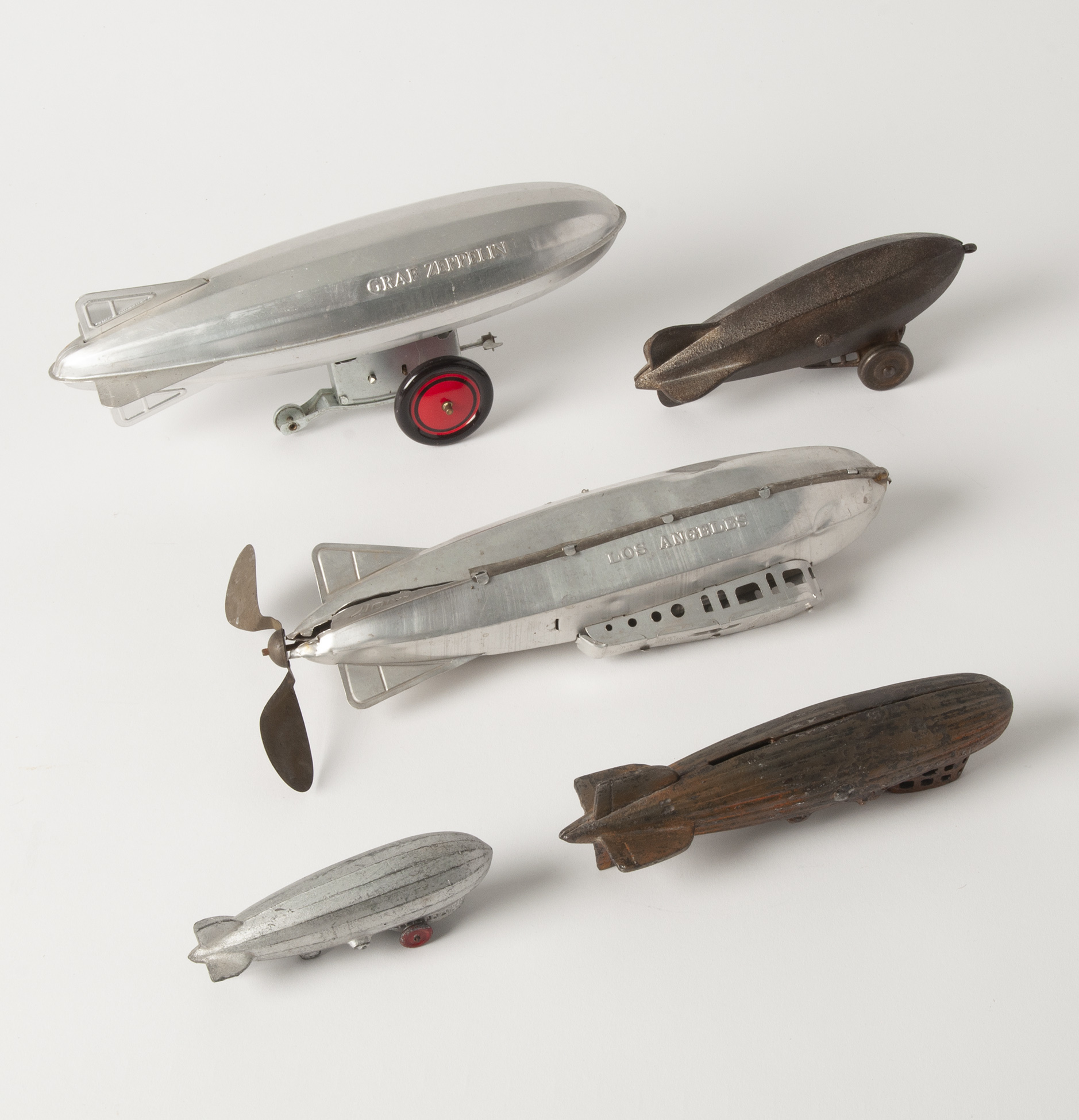 5 Metal Dirigible and Zeppelin Toys | Witherell's Auction House