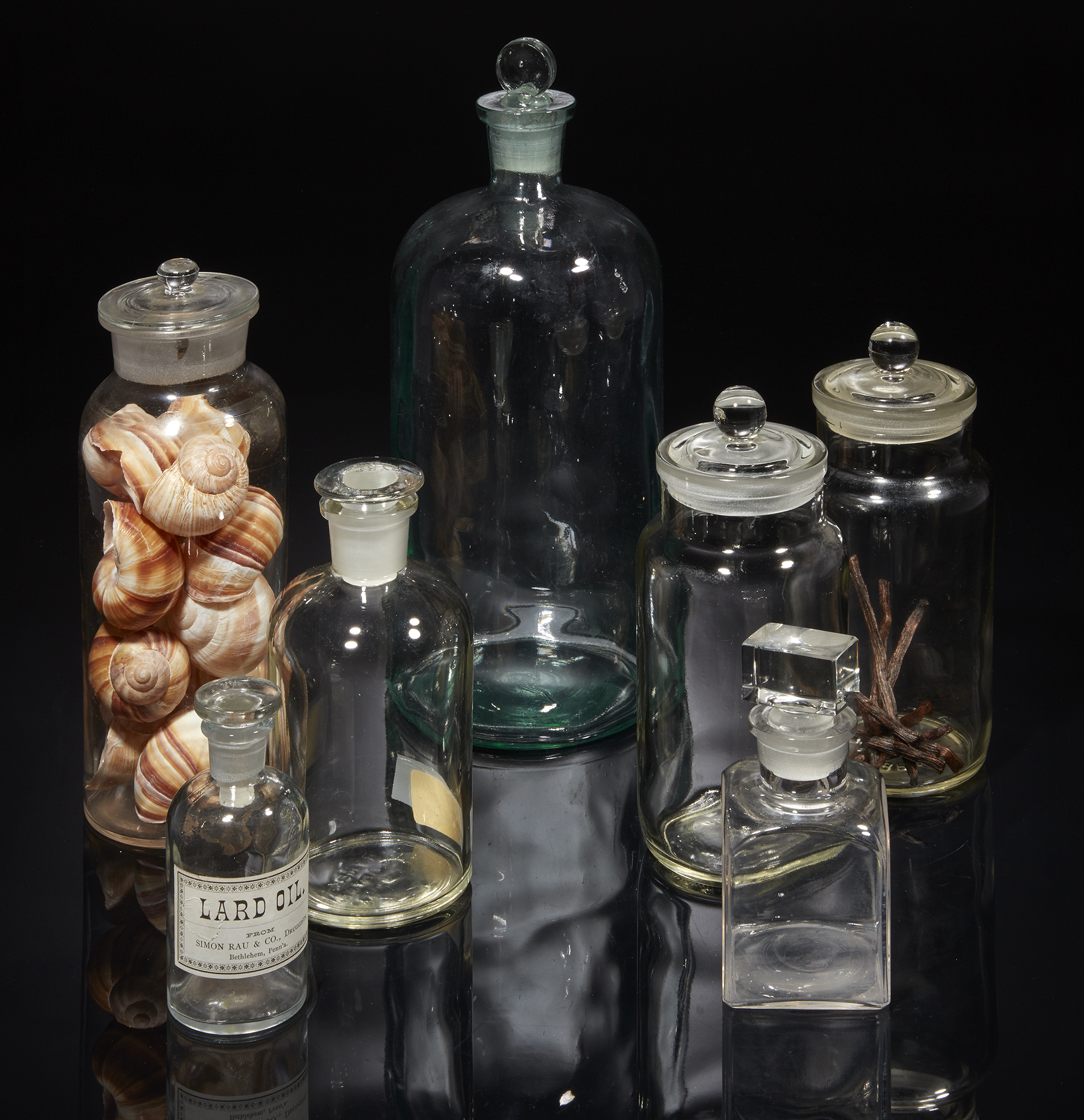 Seven Assorted Glass Jars | Witherell's Auction House