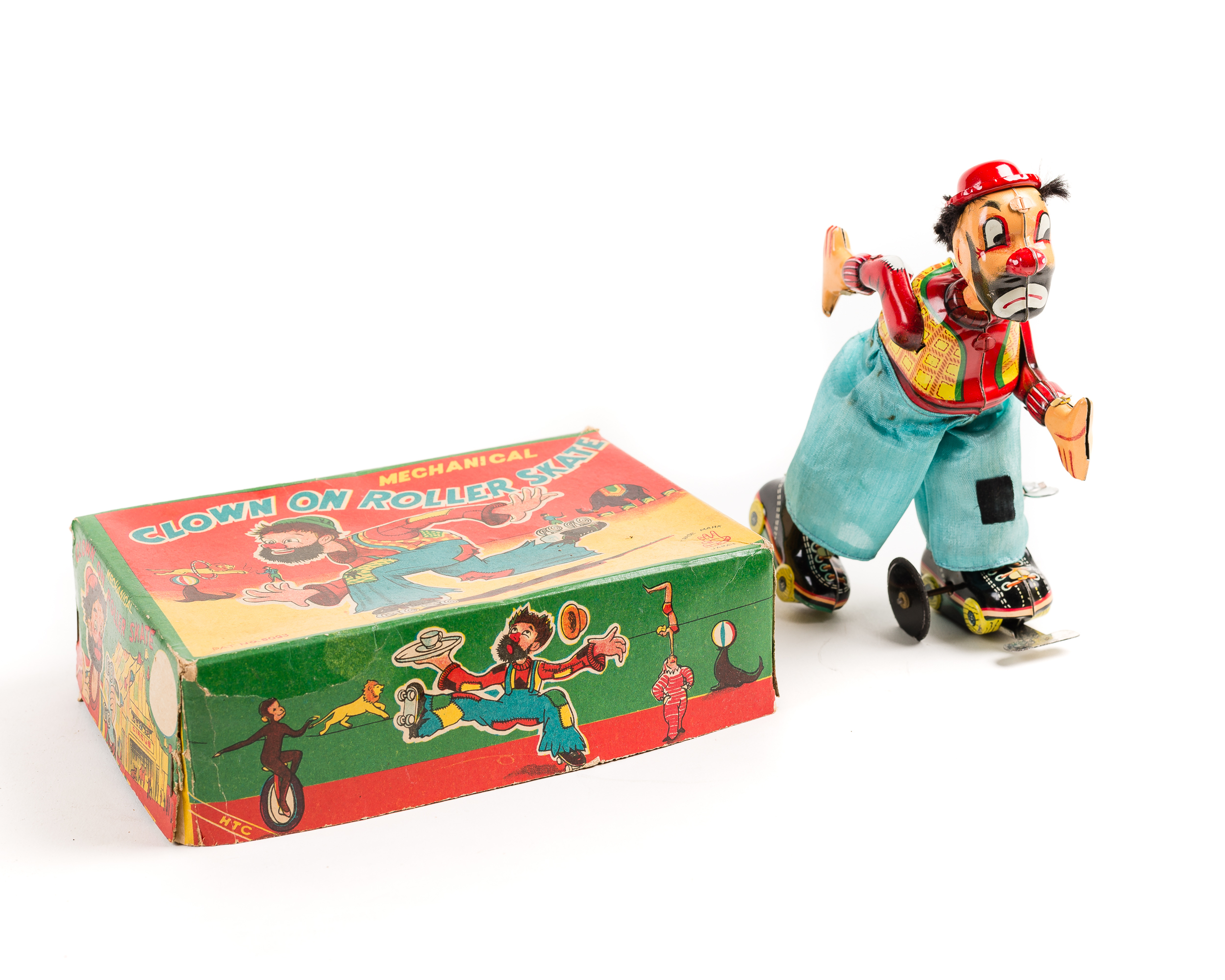 Mechanical Clown on Roller Skates | Witherell's Auction House