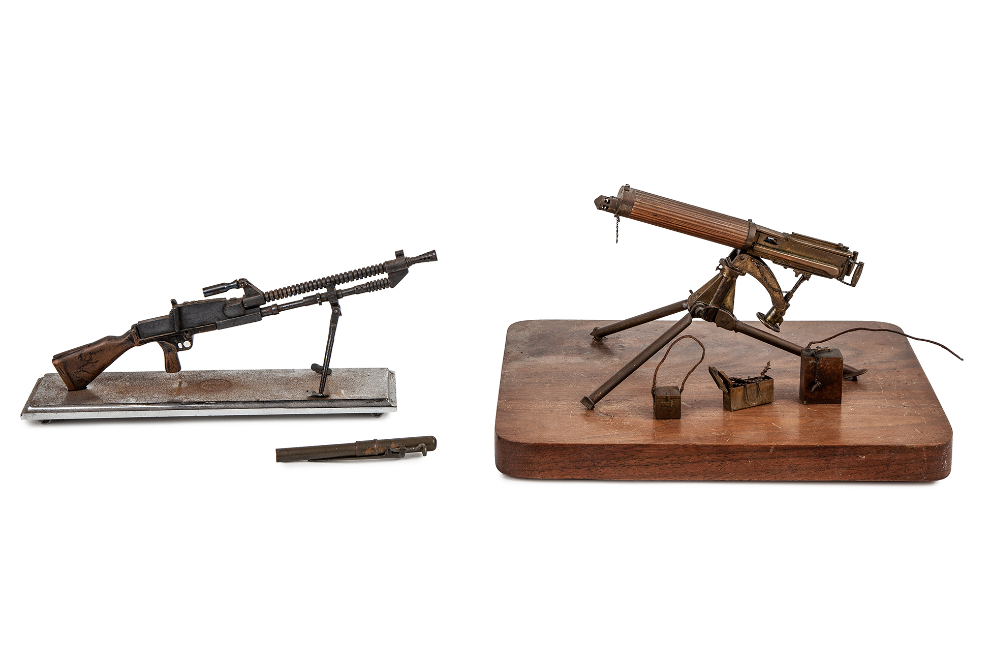 Two Brass Models of Machine Guns | Witherell's Auction House