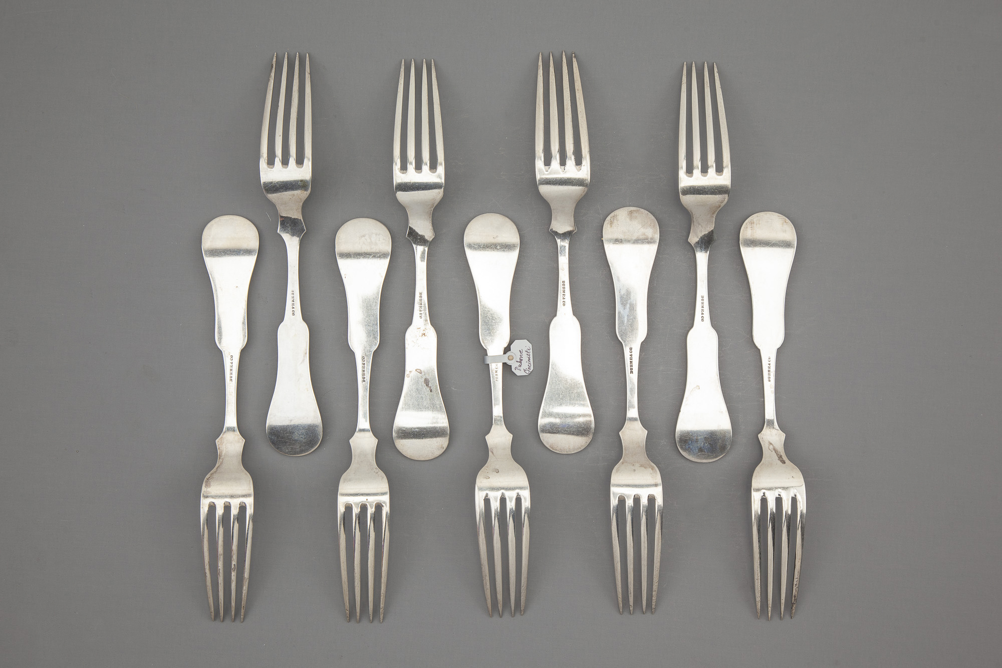 Nine Assorted Coin Silver Forks | Witherell's Auction House
