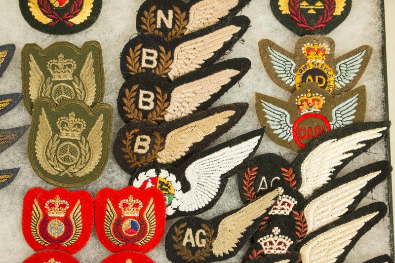 2 Frames of Cloth Canadian and British Wings, incl. 62 half-wings, 33 ...