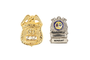 Two Corrections Officer Badges | Witherell's Auction House